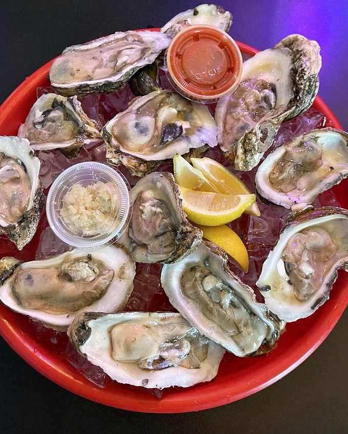 These oysters aren't just served—they're presented like the ocean's jewelry box, glistening with possibilities and a squeeze of lemon.