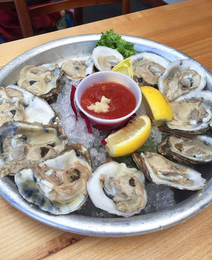 A dozen glistening oysters on ice &ndash; nature's perfect appetizer and the ocean's way of saying "you're welcome" to your taste buds.