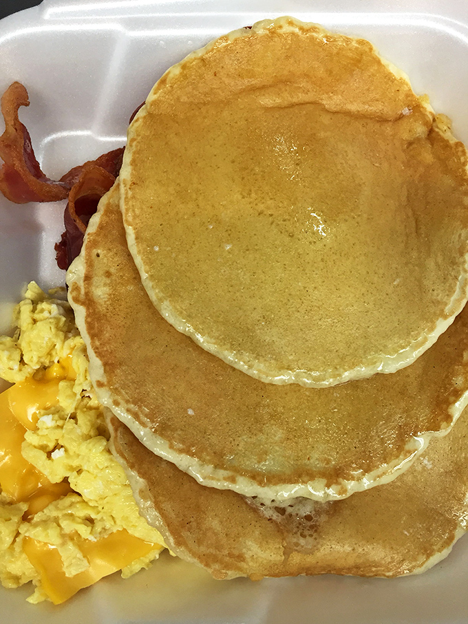Stack of pancakes so golden they could make IHOP executives weep with jealousy. Comfort food doesn't get more comforting than this.