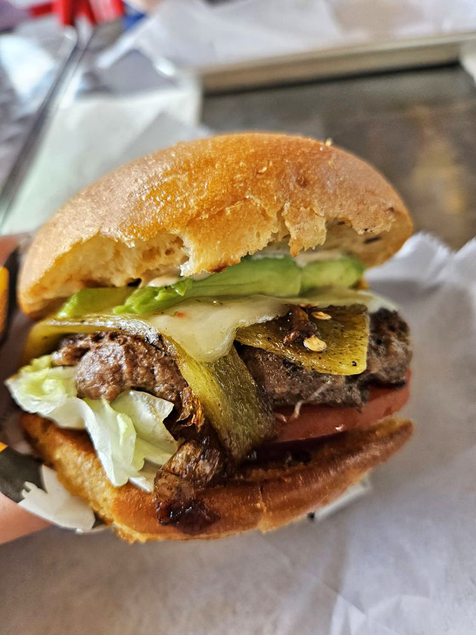 The Pancho Villa Burger doesn't just cross borders&mdash;it erases them. Green chiles and melted cheese create a diplomatic alliance your mouth will celebrate.