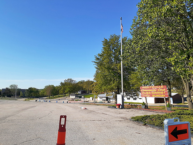 The calm before the treasure-hunting storm. Early morning at the market entrance promises adventures and discoveries for those willing to explore.