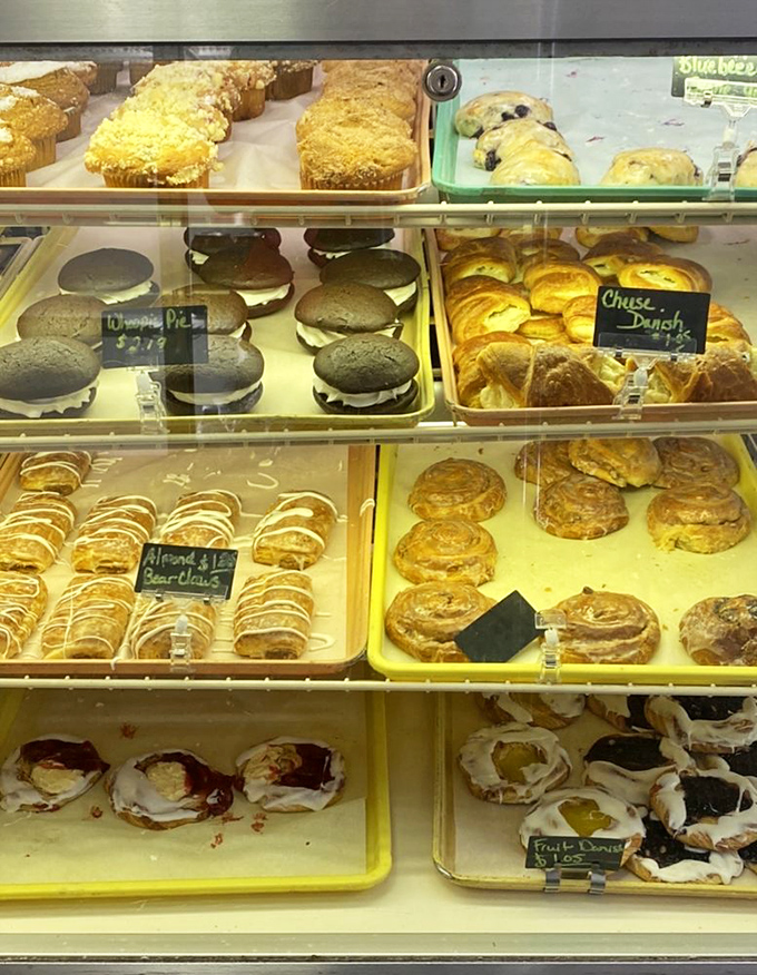 The display case at Sanitary Bakery &ndash; where willpower goes to die and "I'll just have one" becomes the day's most unconvincing lie.