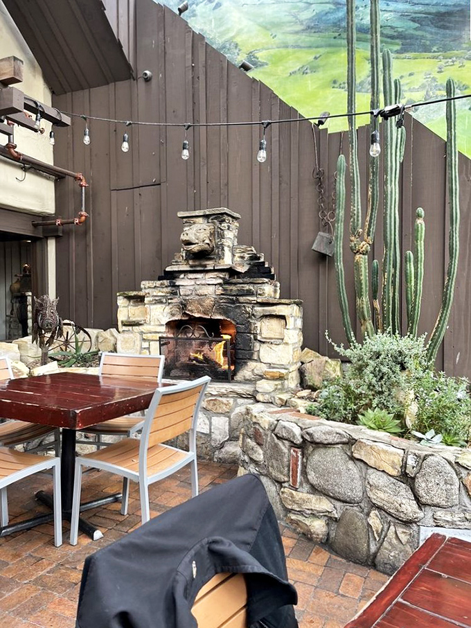 The outdoor patio features a stone fireplace that turns even foggy Carmel evenings into the perfect al fresco dining experience.