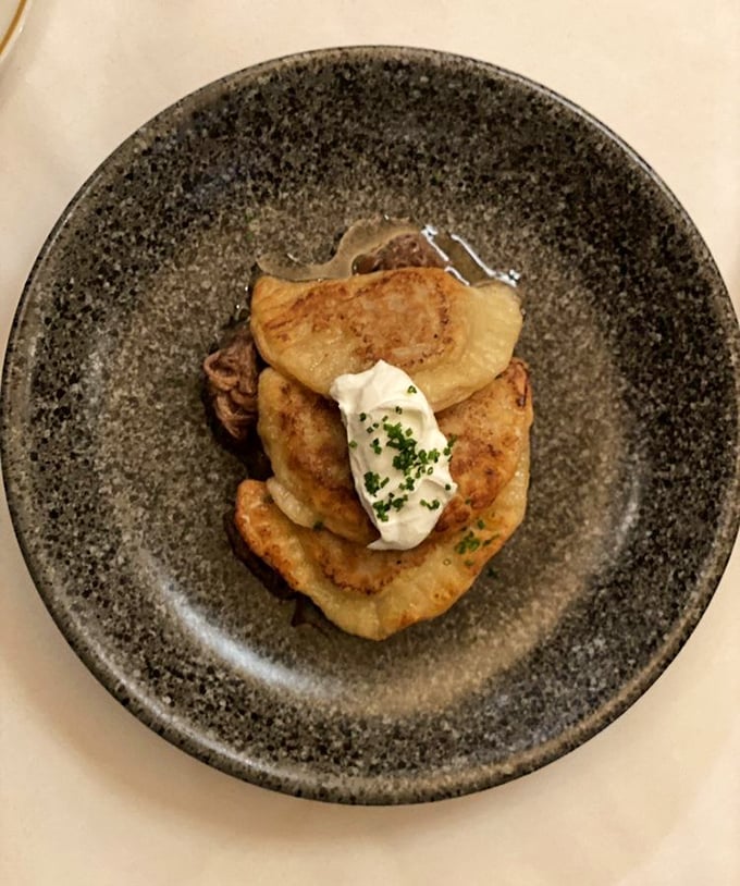 Pierogi that float rather than sit &ndash; delicate pillows topped with fresh herbs and cream that honor Pennsylvania's Eastern European heritage.