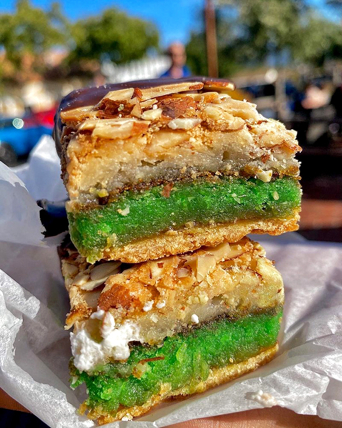 Layers of pistachio, almond, and buttery pastry create a geometric marvel that's equal parts engineering achievement and taste sensation.