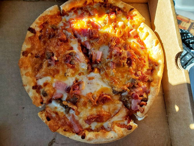 Yes, they make pizza too – because versatility is the secret weapon of true neighborhood dining champions.