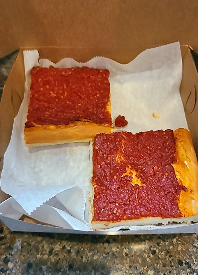 Tomato pie that proves simplicity is the ultimate sophistication &ndash; thick crust, rich sauce, minimal cheese, maximum flavor.