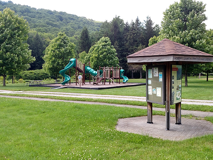 A playground framed by rolling hills &ndash; where kids burn energy and parents secretly wish the slides were adult-sized too.