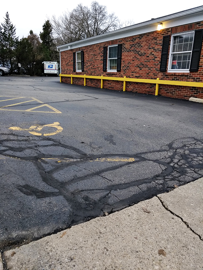 Even Waynesville's Post Office has character&mdash;though I suspect the parking lot has seen better days. Small-town infrastructure, keeping it real.