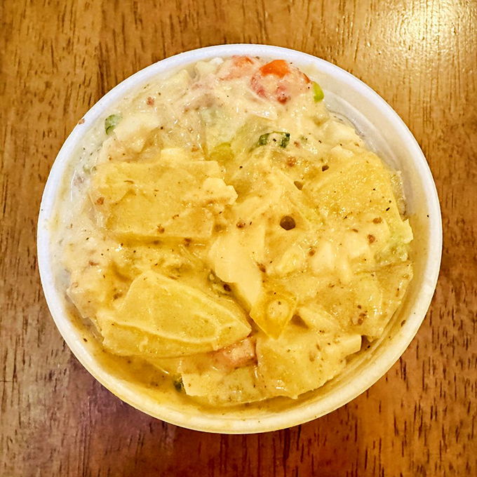 Not your grandmother's potato salad (unless she was secretly a culinary genius) &ndash; creamy, tangy, and substantial enough to stand up to the smokehouse stars. 