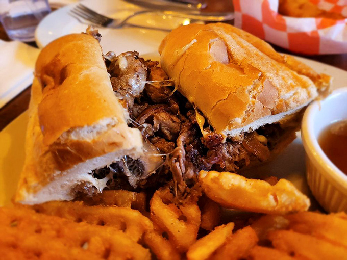 A sandwich so packed with meat it needs structural engineering. This French dip's au jus is practically liquid gold.