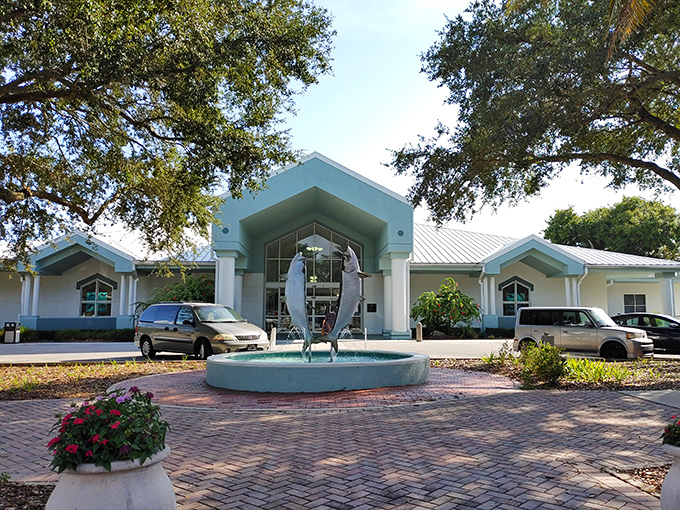 Modern architecture houses Tarpon Springs' cultural treasures, with the dolphin sculpture serving as a playful reminder of the town's connection to the sea.