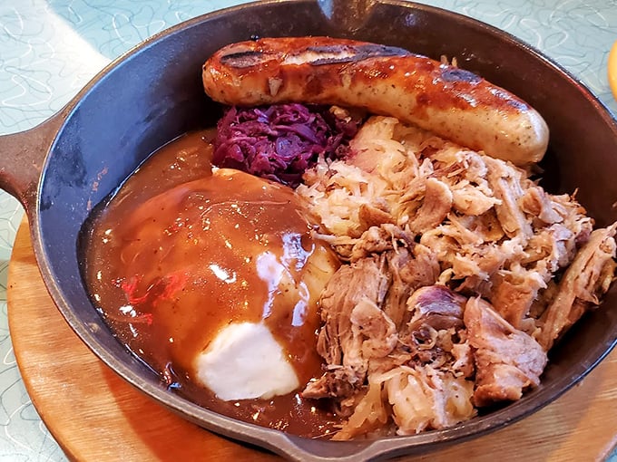 Slow-cooked pulled pork with gravy and a sausage link&mdash;because in Ohio, "I'm not that hungry" still means you need protein for three days.