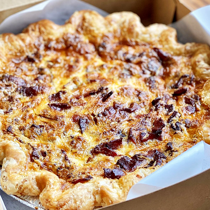 A quiche Lorraine that would make Julia Child slow-clap in approval&mdash;golden, puffy, and studded with bacon like stars in a savory night sky.