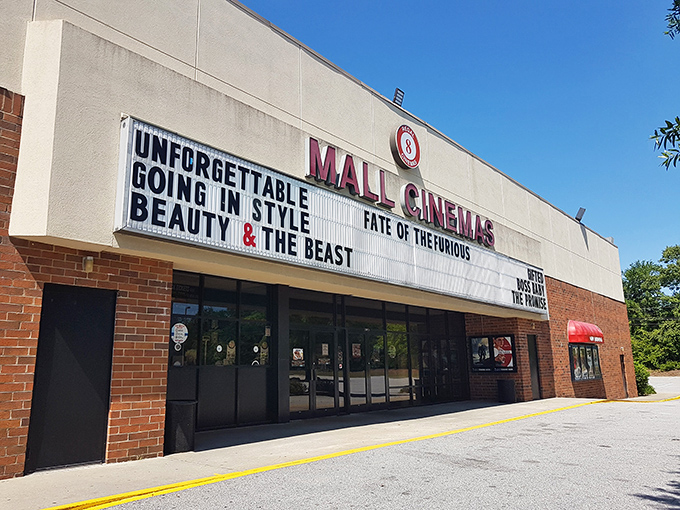 The Mall Cinema's vintage marquee reminds us of a time when movie titles were displayed with actual letters instead of pixels.