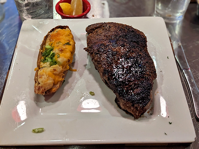 That ribeye's char marks tell the story of a grill master who truly understands fire.