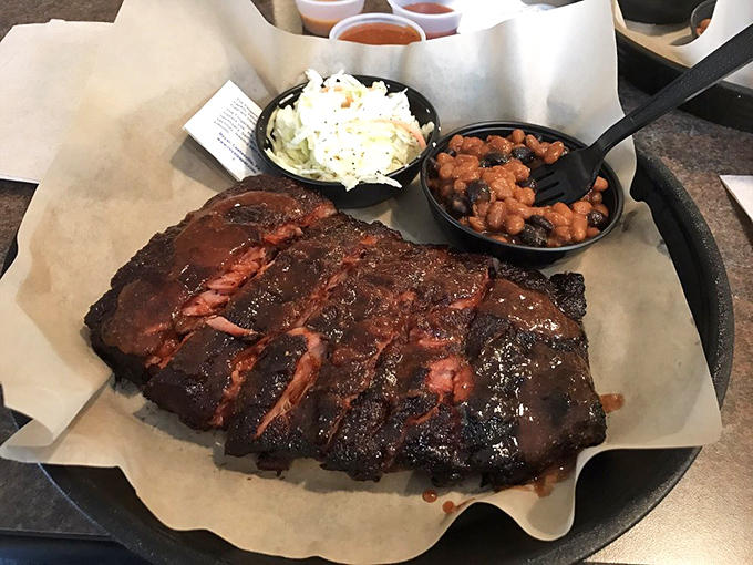 Ribs that would make Fred Flintstone weep with joy. The kind of rack that requires both napkins and a moment of silent appreciation.