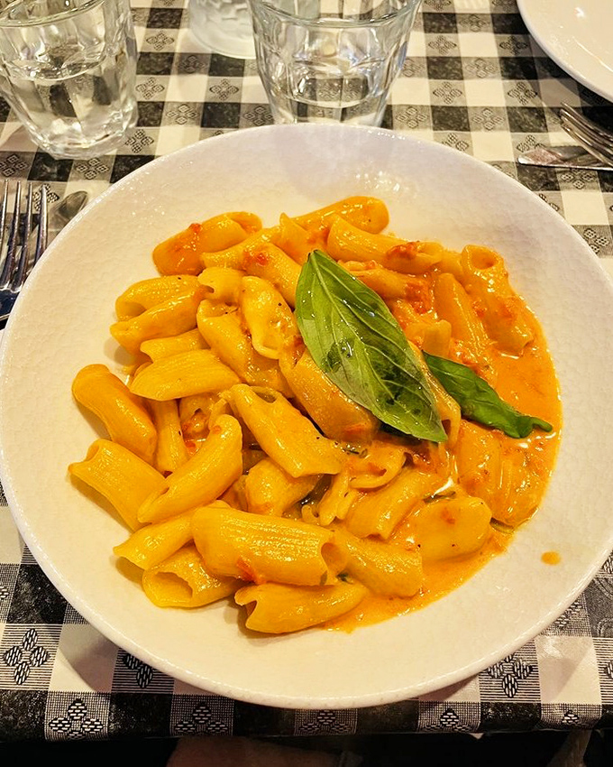 Rigatoni doing what rigatoni does best &ndash; holding onto sauce like its life depends on it.