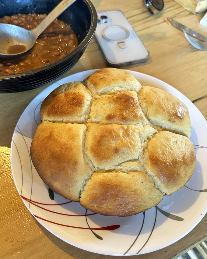 These golden-topped rolls aren't just bread&mdash;they're pillowy vessels of buttery goodness that somehow find room in your already-stretched stomach.