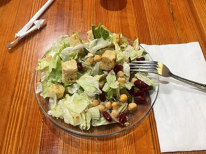 Even the salad has personality here &ndash; a garden of greens, beans, and croutons that doesn't feel like punishment.