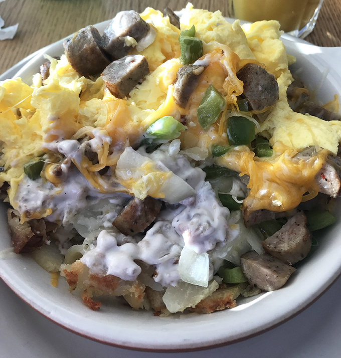 This hearty bowl of eggs, potatoes, sausage, cheese, and gravy doesn't just feed you&mdash;it hugs you from the inside. Comfort food that means business.