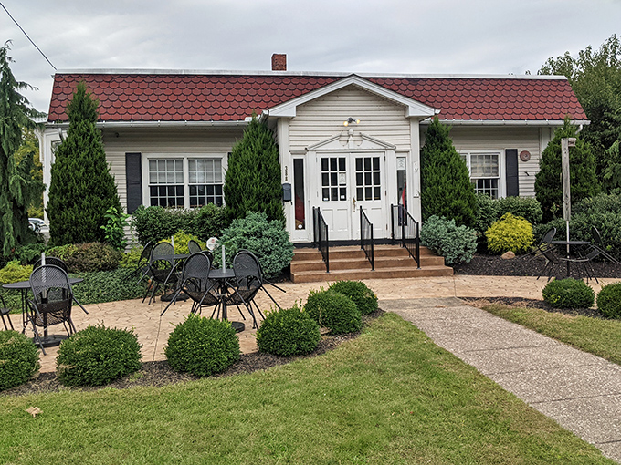 With its manicured landscaping and inviting porch, this coffee shop promises conversations as rich as its brews.
