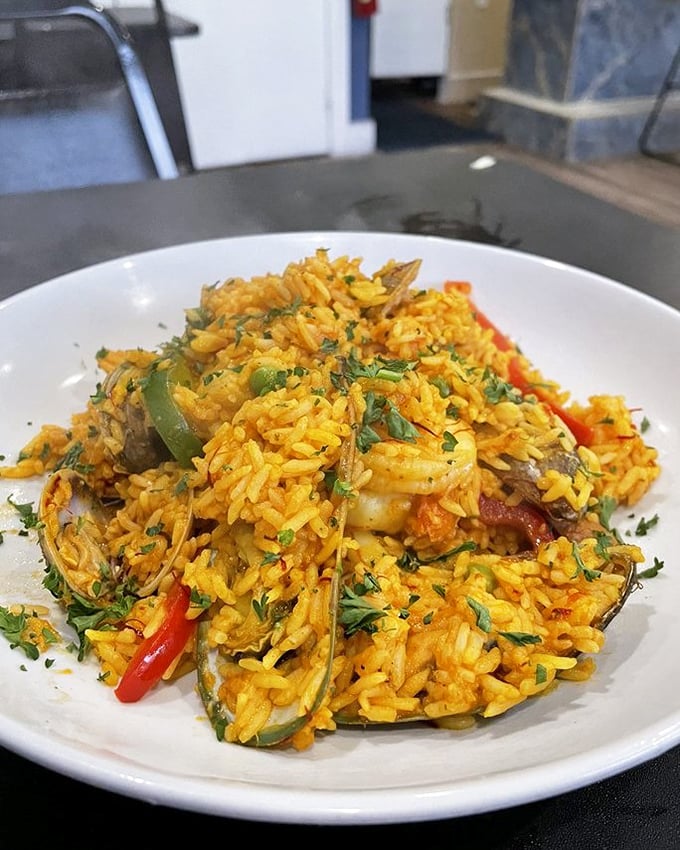 Paella that's a sunset on a plate&mdash;saffron-tinted rice cradling treasures from both land and sea in a harmonious gathering that would make United Nations diplomats jealous.