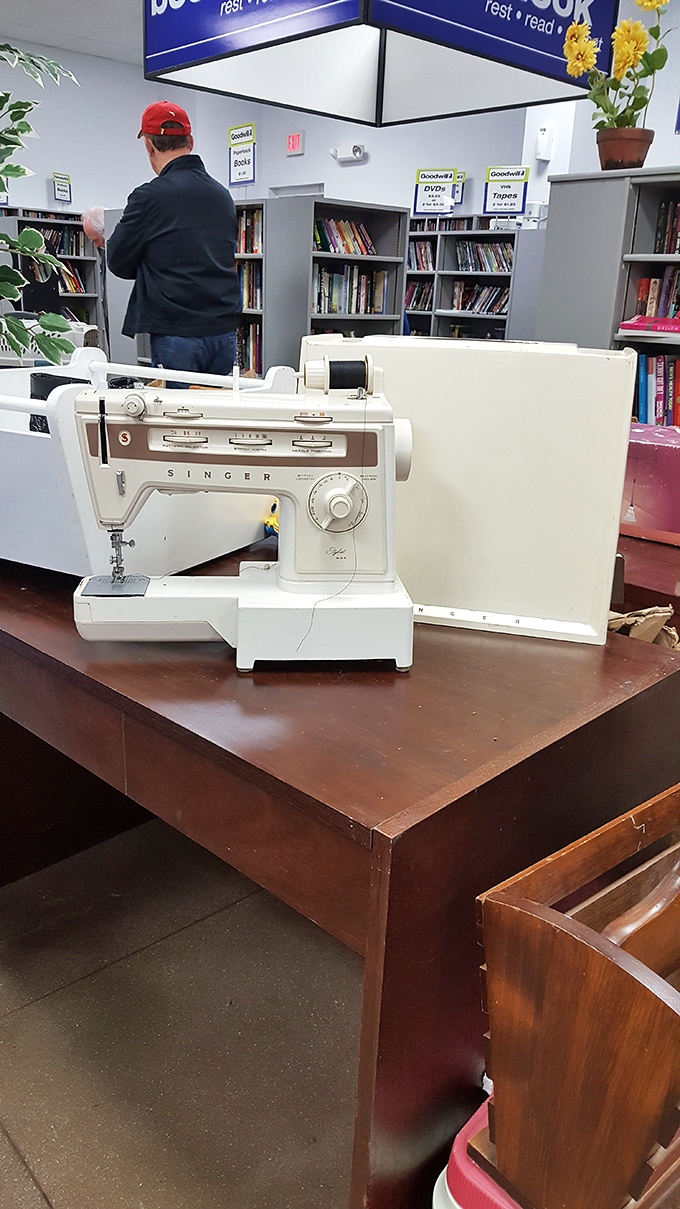 A vintage Singer sewing machine awaits its next creative partner. Like finding Julia Child's spatula, some tools carry the creative energy of all who used them before.