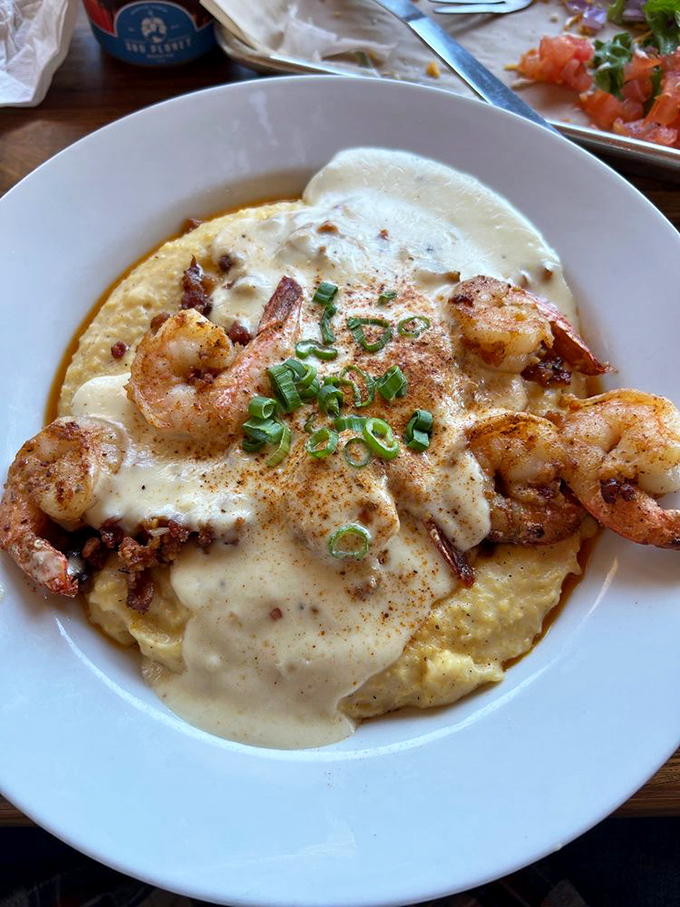 Shrimp and grits elevated to an art form &ndash; creamy, savory perfection that would make any Southern grandmother nod in approval.