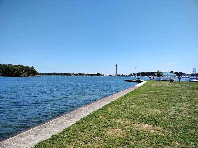 The line where land meets lake creates nature's perfect border. This pathway promises views that no smartphone camera can truly capture.