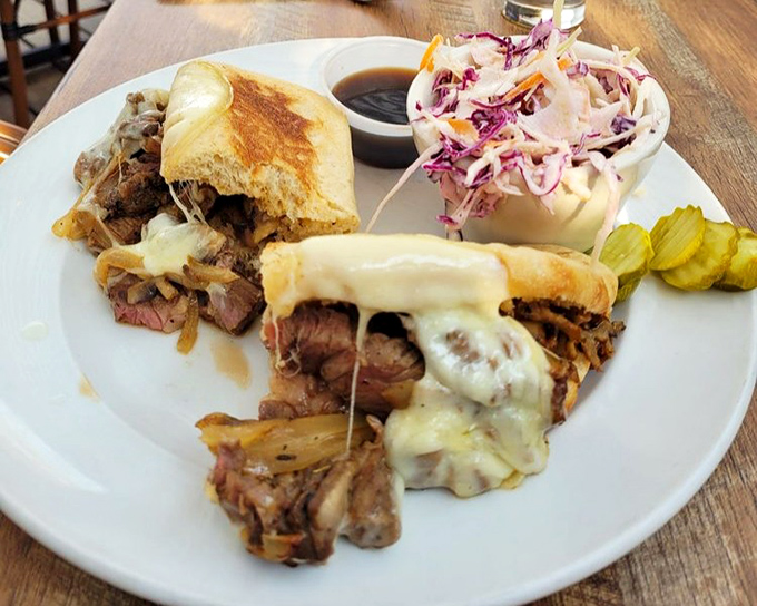 A sandwich that means business&mdash;tender prime rib, melted cheese, and caramelized onions creating the holy trinity of lunchtime perfection.