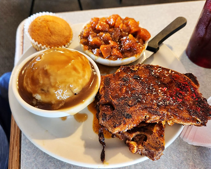 Ribs so tender they practically surrender to your fork, accompanied by sides that refuse to be overshadowed. A barbecue triumph.