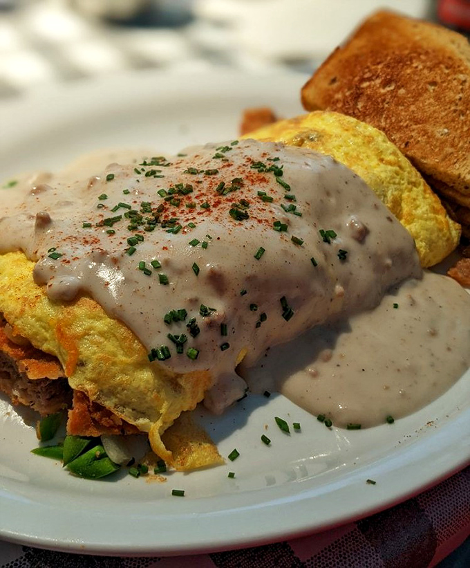 When breakfast needs a hug, it gets smothered in gravy. This dish doesn't just satisfy hunger&mdash;it banishes it to another dimension.