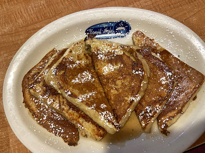 French toast that makes regular toast look like it's not even trying. Powdered sugar sprinkled like Florida's version of snowfall.