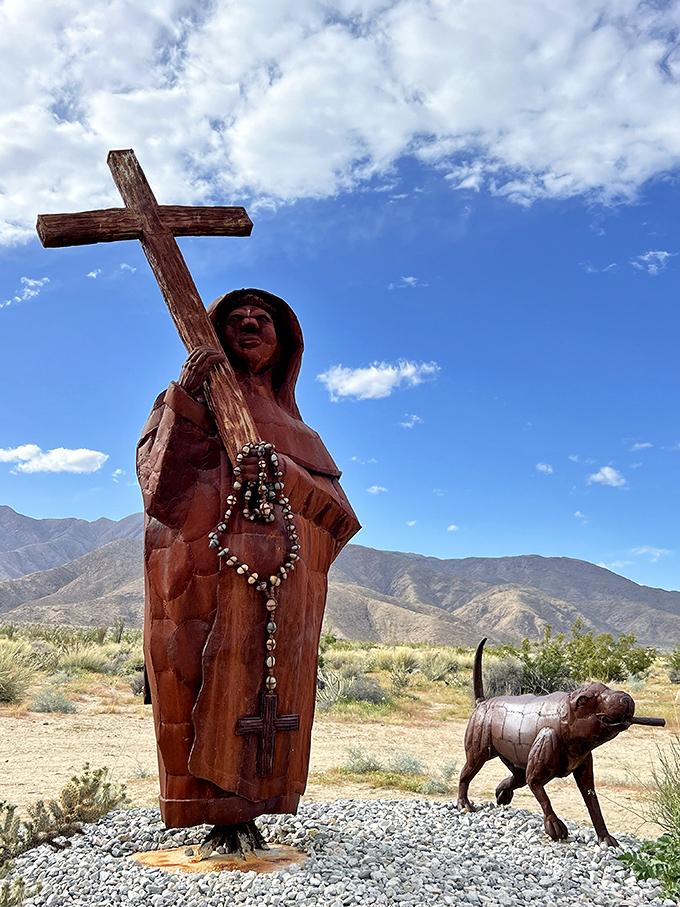 Faith meets frontier in this poignant sculpture of a Spanish padre with his faithful companion, standing watch over the desert's vast expanse.