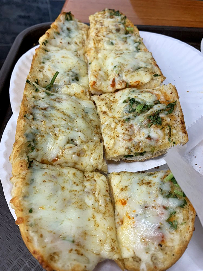 Garlic bread elevated with fresh herbs transforms a simple side into something worth writing home about.