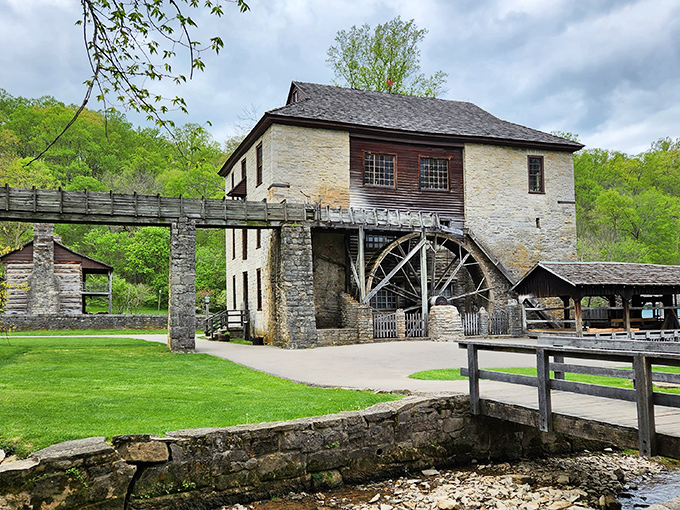 Spring Mill's historic gristmill stands as a testament to pioneer ingenuity, its massive water wheel still turning just as it did centuries ago.