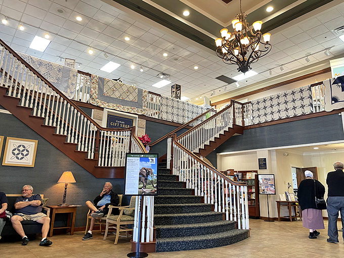 The grand staircase isn't just functional&mdash;it's a promise of more treasures upstairs, like Willy Wonka's factory but with quilts instead of Oompa Loompas.