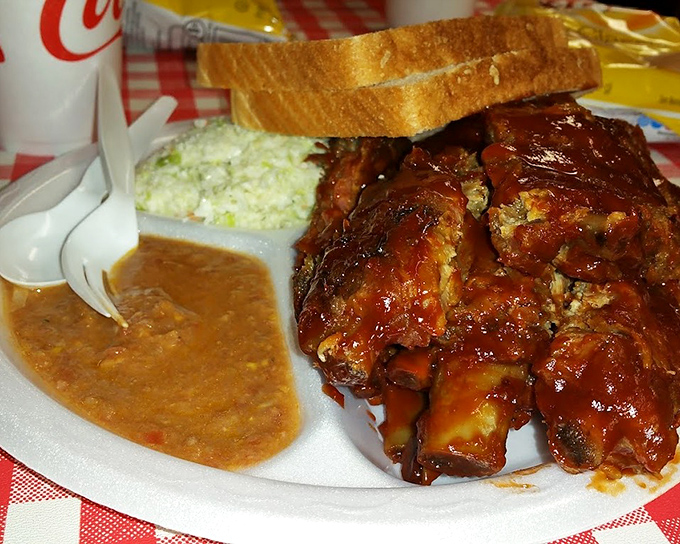 A plate that answers the eternal question: "Why choose between ribs, slaw and stew when you can have the complete Georgia barbecue experience?"