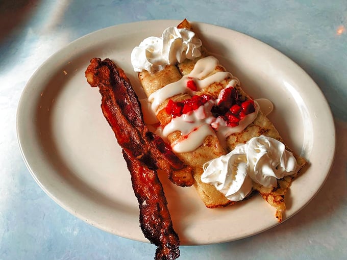 Breakfast dessert or dessert breakfast? These crepes with strawberries and cream blur the line deliciously, with crispy bacon providing the perfect savory counterpoint.