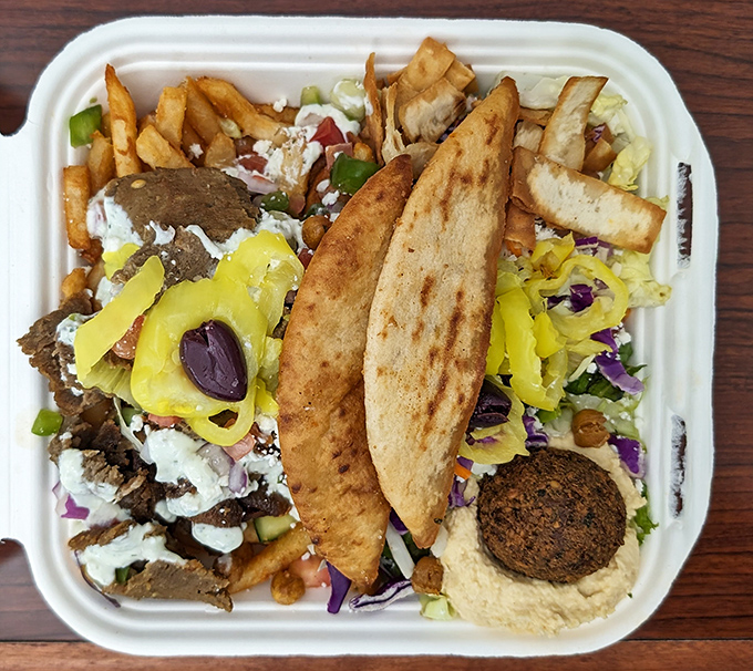The Street Greek Gyro Combo&mdash;a beautiful marriage of flavors that proves sometimes the best relationships are the messiest ones.