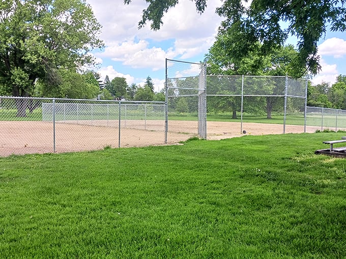 Sunset Park's baseball diamond: where local legends are born and grandparents perfect the art of sideline coaching. America's pastime, Kendallville style.