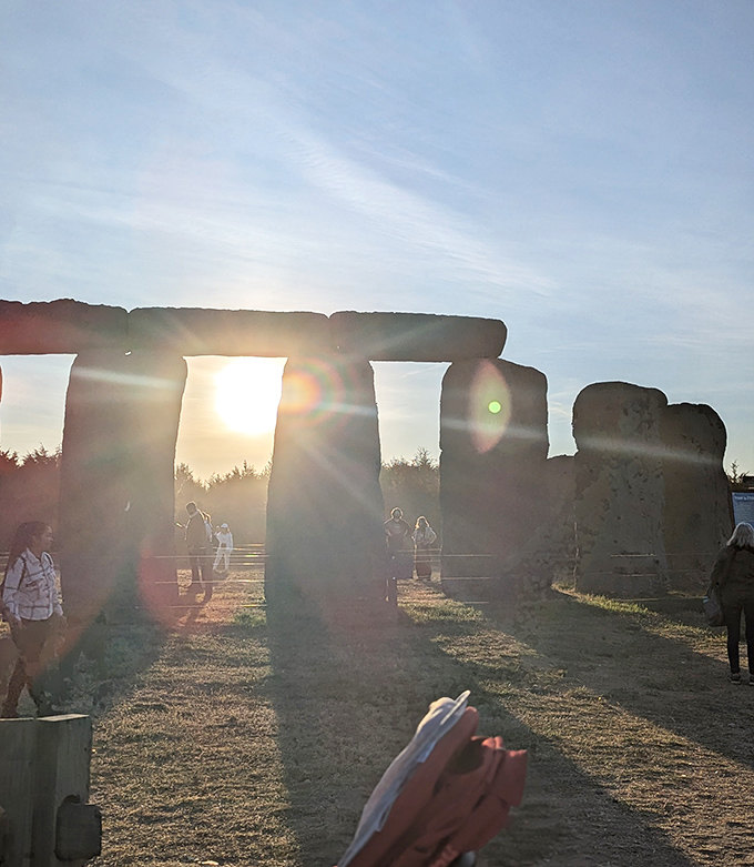 Sunlight streams through the precisely aligned archways, creating the same magical effect that has captivated visitors for millennia.