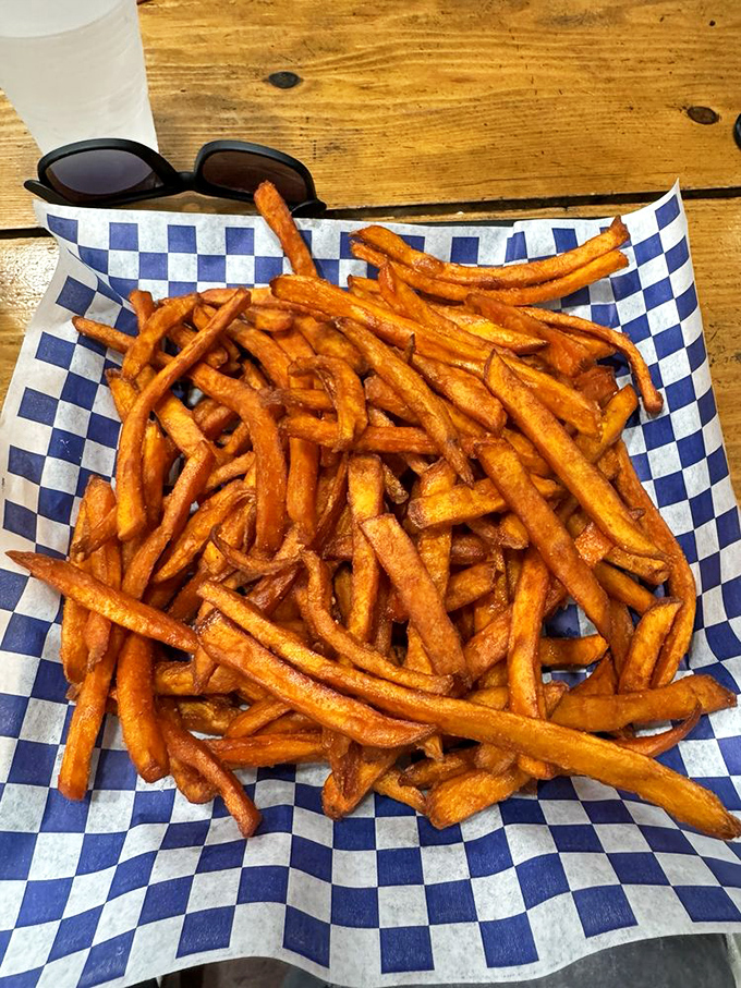 Sweet potato fries that achieve the impossible: crispy edges, fluffy centers, and enough flavor to make you forget regular potatoes ever existed.