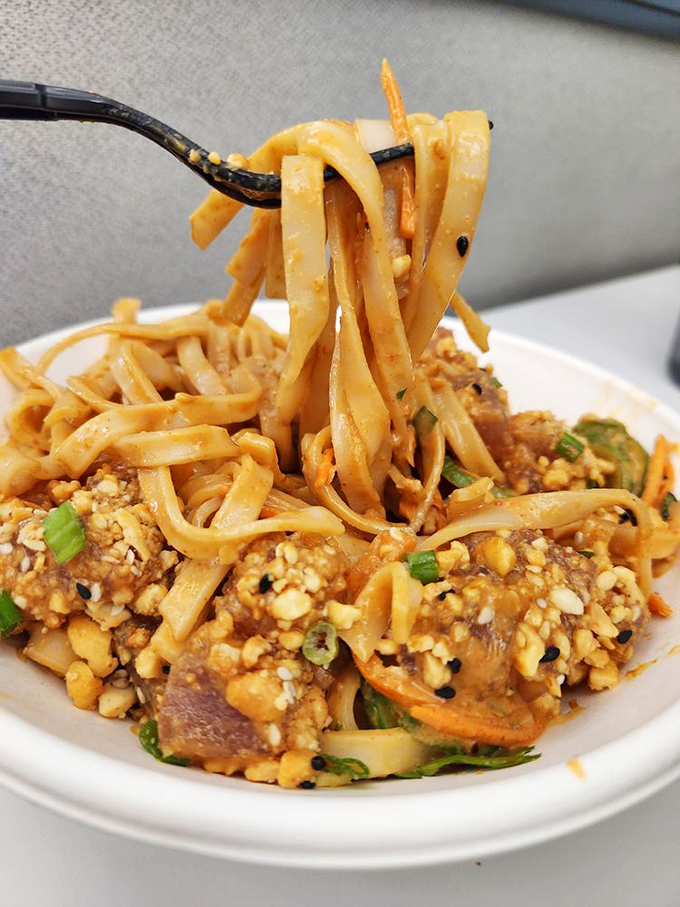 Thai-inspired noodles dance with peanut sauce in a bowl that brings Southeast Asian sunshine to Scottsdale. 