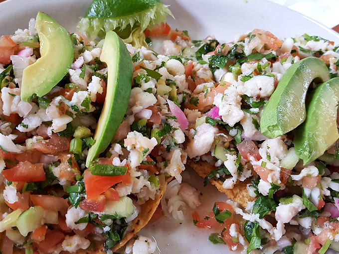 This ceviche tostada is summer on a crispy tortilla. The avocado slices are like exclamation points in a delicious conversation.