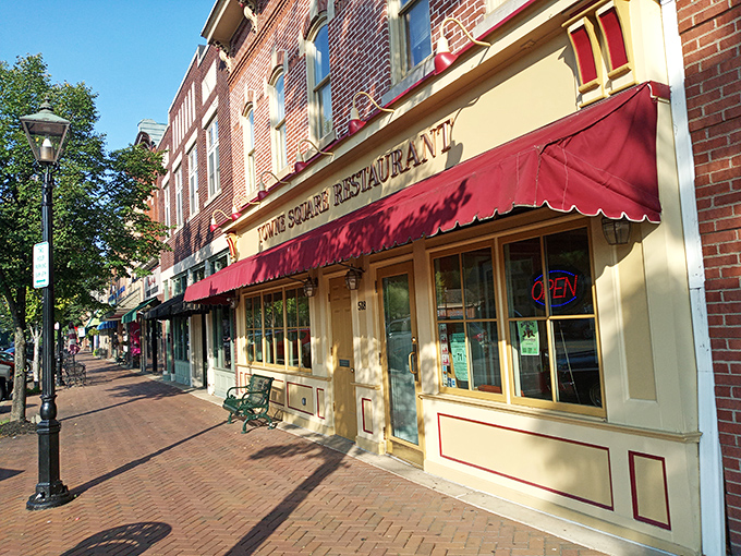 Behind that classic red awning lies comfort food that makes you wonder if your grandmother secretly moonlights in the kitchen on her days off.
