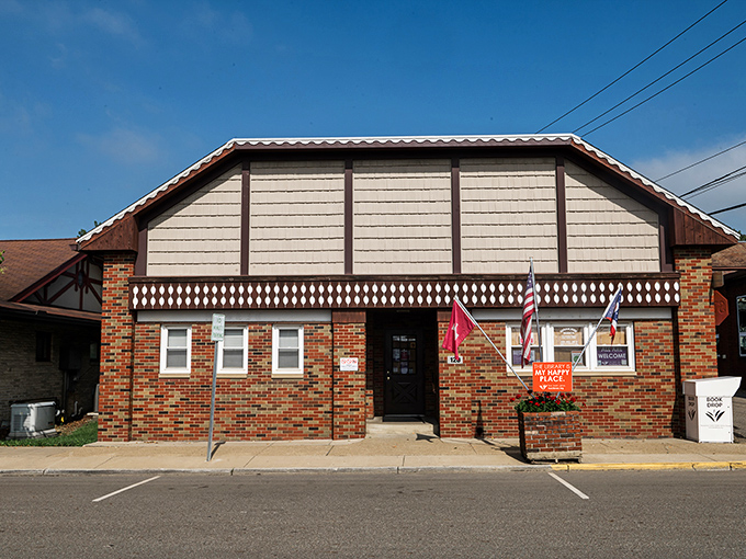 The local library's brick facade reflects a community that values both knowledge and time-honored traditions equally.