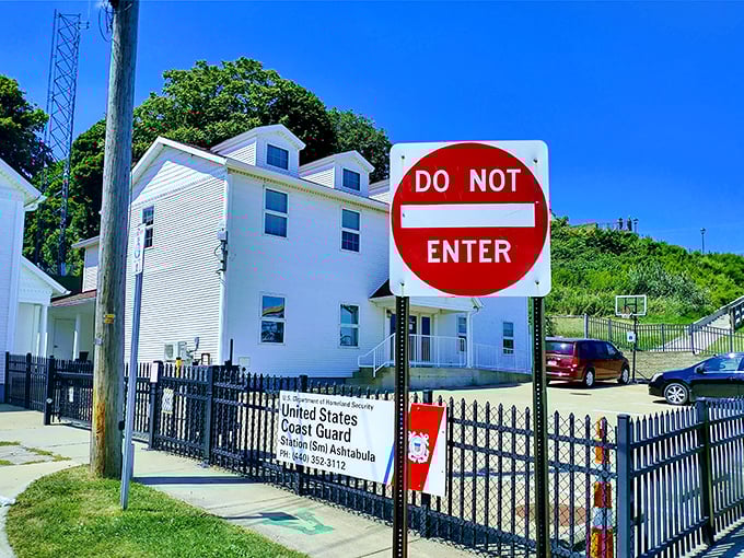 Even the "Do Not Enter" sign can't diminish the crisp, nautical charm of the U.S. Coast Guard station standing watch over Lake Erie.