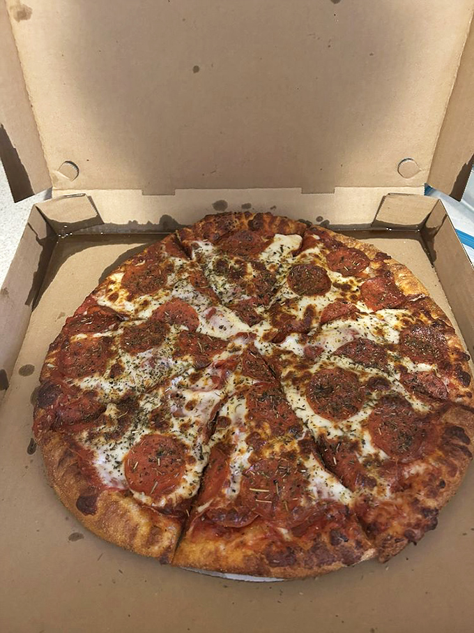 When pepperoni dreams of stardom, this is what it imagines. Each slice carries enough of these crispy discs to make a meat-lover weep with joy.